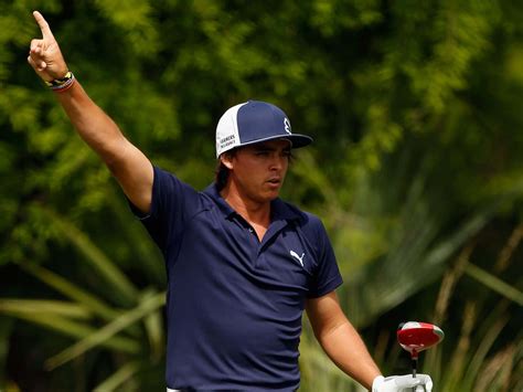Download Briny Baird Showing His Perfect Golf Swing Under The Beautiful