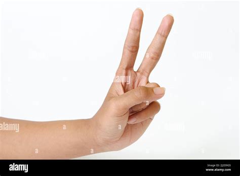An Adult Caucasian Female Hand Showing Peace Sign Or Victory Sign