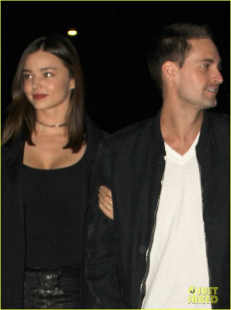 Miranda Kerr And Evan Spiegel Couple Up At Kanye West Concert Photo