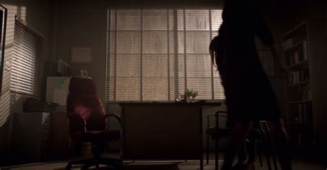 Female Pukes Black Substance Onto Desk