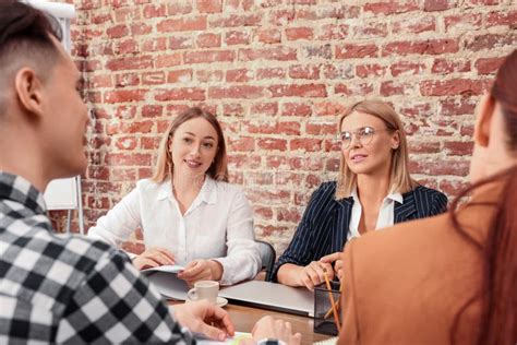 Businesswoman Having Meeting With Her Employees In Office Lady Boss
