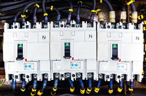 Premium Photo Electric Cables Connected To A Distribution Block With Switches Closeup