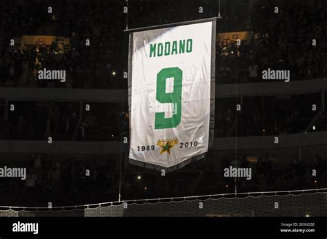 A Banner Representing The Retirement Of Mike Modanos No 9 Jersey Is
