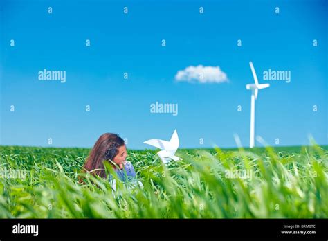 Girl With Wind Turbine Stock Photo Alamy