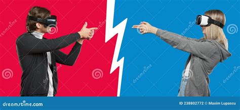 Rivals In Vr Goggles Playing Against Each Other In Cyberspace Stock