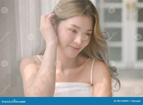 Portrait Of Beautiful Young Korean Or Japanese Girl With Natural Make