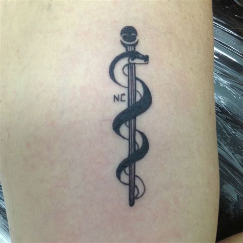 Rod Of Asclepius Tattoo Designs Ancient Symbol Meaning And Modern Artistry