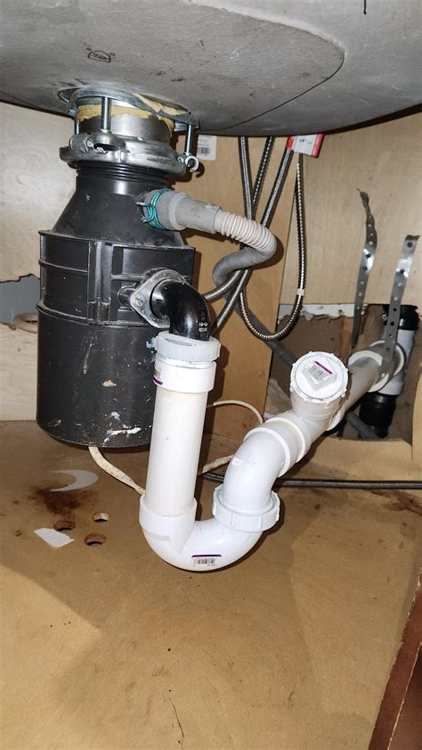 How to open to clean garbage disposal : r/Plumbing
