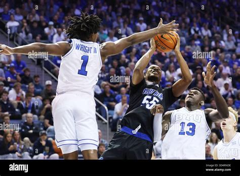 Delaware Guard Jameel Brown Tries Top Shoot On Byu Guard Robert Wright Iii During The First Half