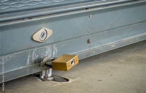 Rolling Shutter Door Closed With Lock Foto De Stock Adobe Stock