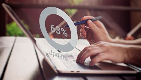 Man Using Laptop At The Table Update The Operating System To A Newer