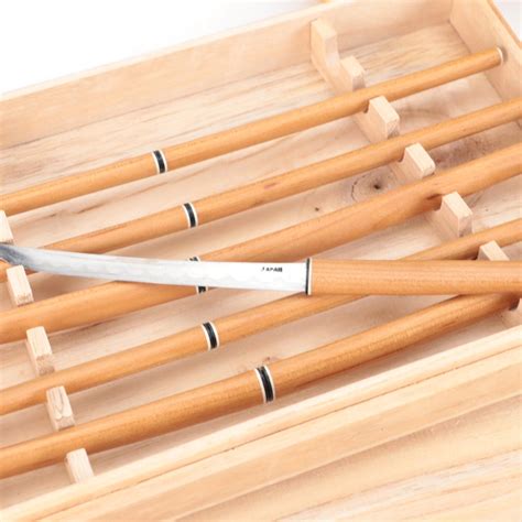 Japanese Knife Set Brass Bells Carved Stone Cups And Baoding Iron