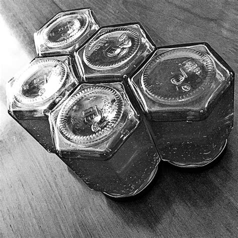 Premium Photo Glass Jar Of Organic Thick Bee Honey Stands On Wooden Table