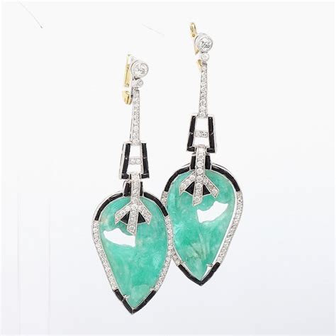 Platinum Earrings With Carved Emeralds Round Brilliant Cut Diamonds