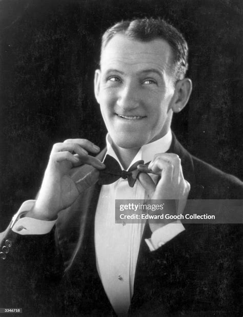 Performance Artist Sandy Rowan Adjusting His Bow Tie News Photo