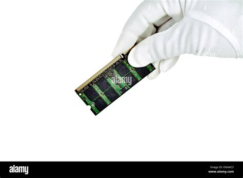 A Computer Memory Chip Held By White Gloved Hand Isolated On White Stock Photo Alamy
