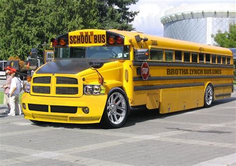 Yellow School Bus Parked In Front Of A Building Exotische Autos