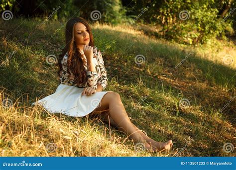 Girl Sits On Grass And Poses Stock Image Image Of Beautiful Person 113501233