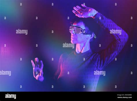 Binary Code On Woman Wearing Futuristic Glasses Against Black