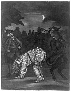 Filea Tarred And Feathered Man Standing On Hands And Feet With A Rope