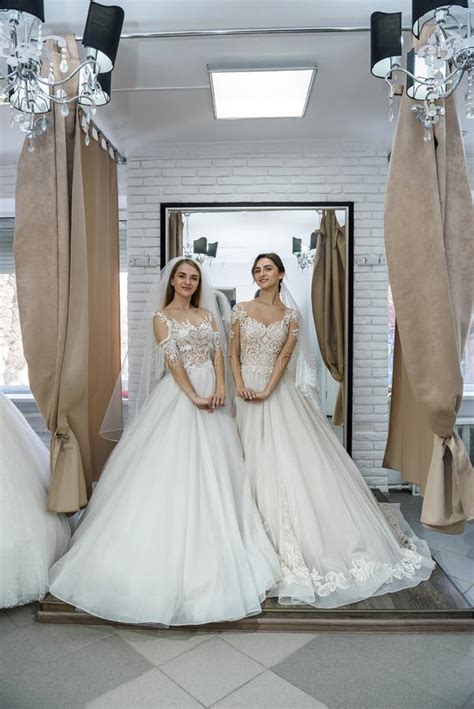 Happy Brides In Wedding Dresses Posing In Salon Stock Image Image Of
