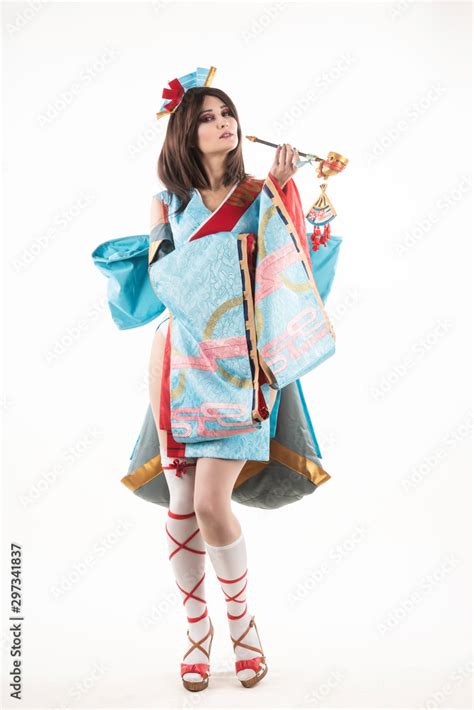 Beautiful Leggy Busty Cosplayer Girl Wearing A Stylized Japanese Kimono