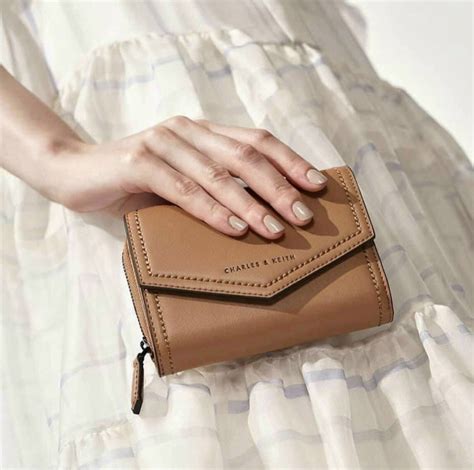 Ví bì thư CNK Bóp đựng tiền CNK cầm tay mẫu mới nhất