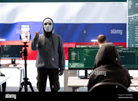 Anonymous Person With Mask Asks For Ransom In Russian Governmental Hacking Room With The