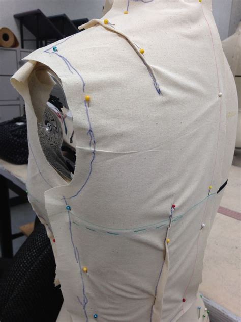 Once The Back Has Been Pinned Properly There Should Be Two Darts One