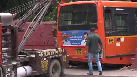 Agency News Cluster Bus Rams Through Cemetery Wall In Delhis Khan
