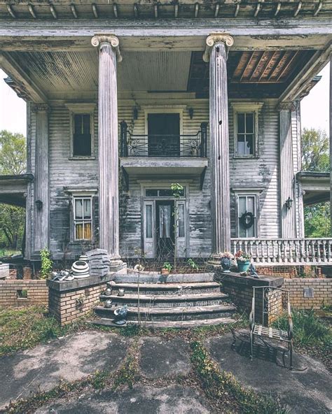 Beautiful Front Pillars Of An Victorian Style Abandoned House