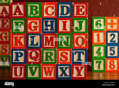 Alphabet Blocks Stacked Together With Numbered Blocks Stock Photo Alamy