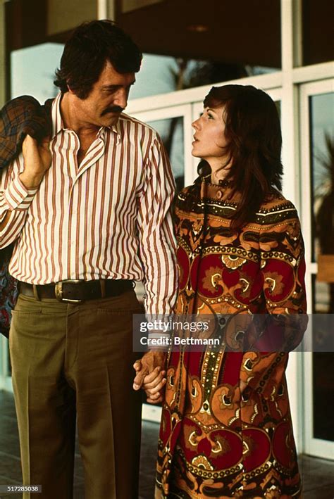 Actor Rock Hudson And Actress Susan Saint James Are Shown In A Scene