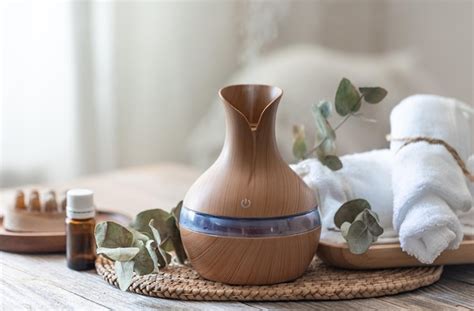 Premium Photo Spa Composition With Aroma Oil Diffuser Lamp On A