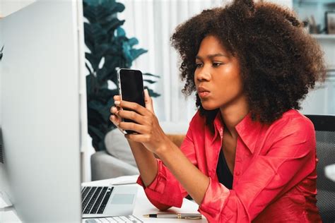 Premium Photo Young African Businesswoman Focusing Project On Screen Monitor Tastemaker