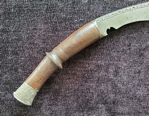 An Early Silver Mounted Hanshee Kukri In Knives