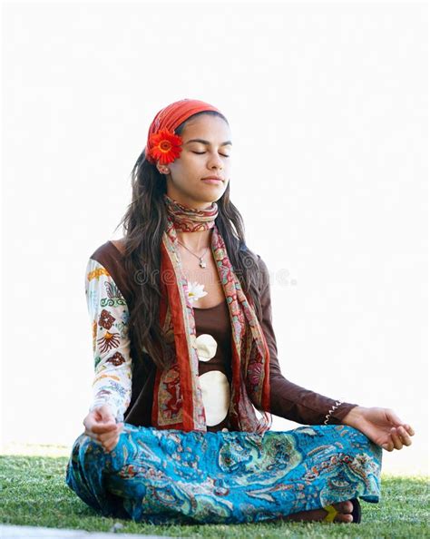 Unleashing My Inner Buddha Shot Of A Young Hippie Concentrating On Her
