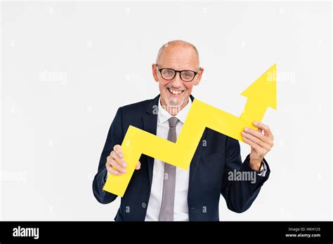 Man Holding Arrow Goes Up Concept Stock Photo Alamy