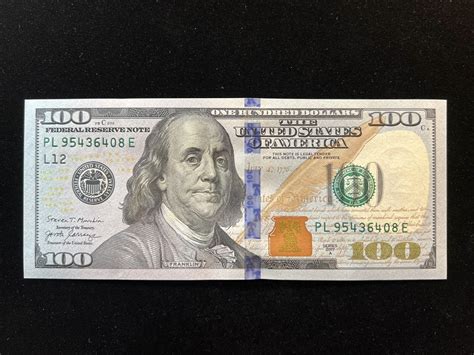 100 Dollar Bills In A Bundle