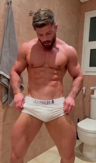 Sexy Hot Muscle Hunk Showing Off His Body And Jerking ThisVid