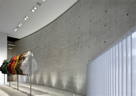Tadao Ando Divides Duvetica Store With Curved Concrete Wall