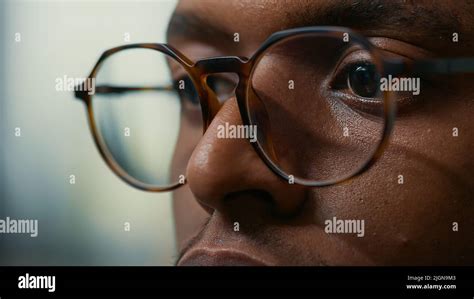 Closeup Portrait Of African American Database Developer With Glasses