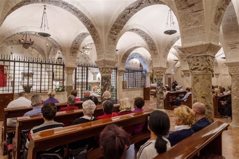 Prayer At The Tomb Of Saint Nicholas In The Crypt Of The Basilica Of St