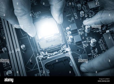 Installing Central Processor Unit Into Computer Motherboard Stock Photo Alamy