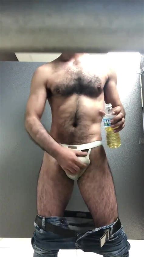 Guy Pisses Into Bottle In Toilet Stall And Drinks It