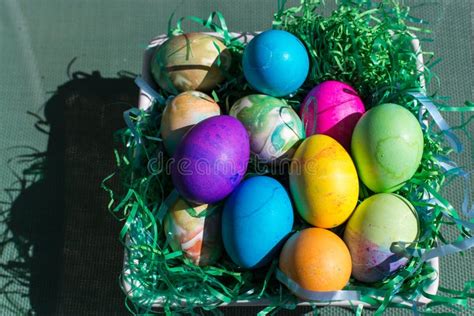 Multi Colored Easter Eggs In Green Plastic Grass Stock Image Image Of