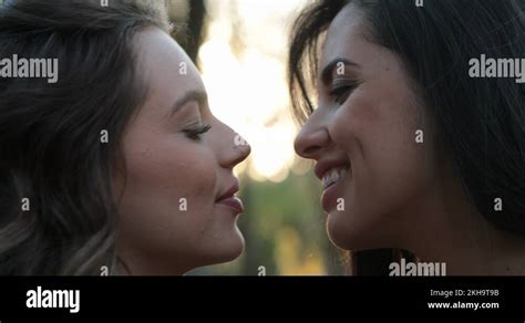 Two Girls French Kissing Outside At The Park Lgbt Lesbian Couple Kiss