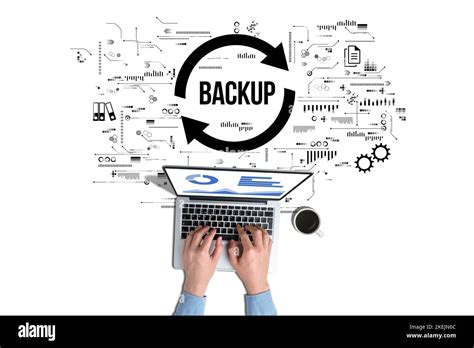 Data Backup For Data Recovery To Original Or New Location The Person Is Working On A Laptop