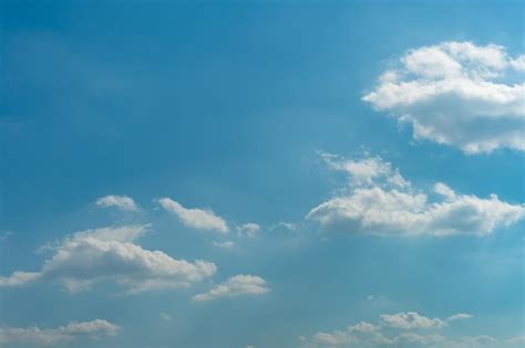 Premium Photo Beautiful Fluffy Clouds In The Evening Sky The Sunlight