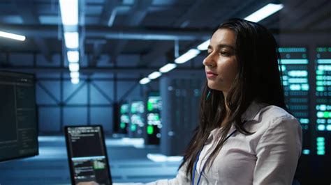 Premium Stock Video Computer Scientist In Data Center Monitoring